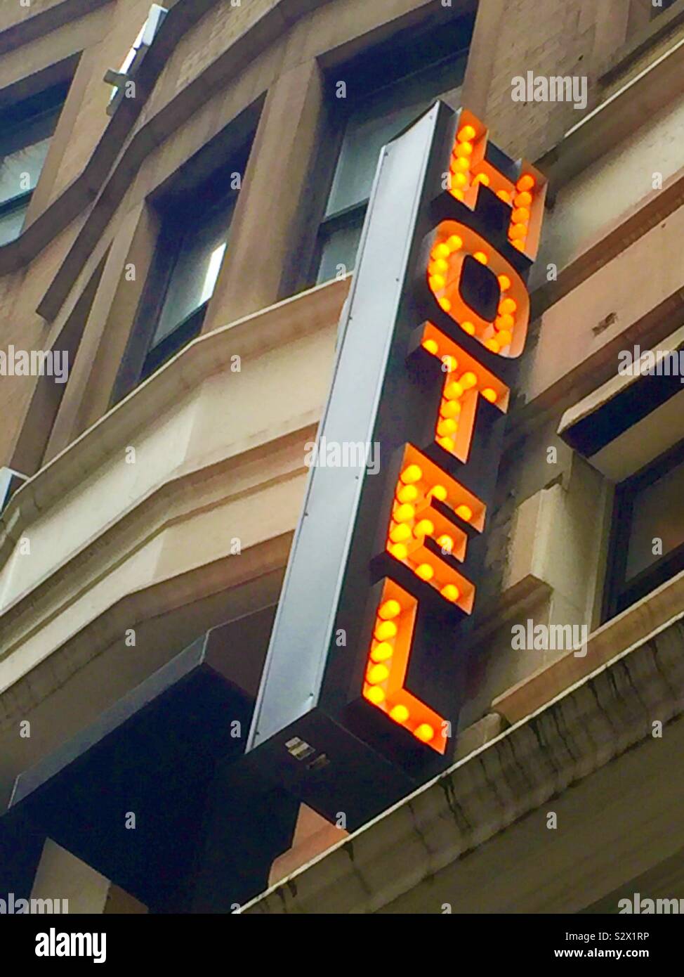 Sign shining brightly on the exterior of a hotel building, USA Stock ...