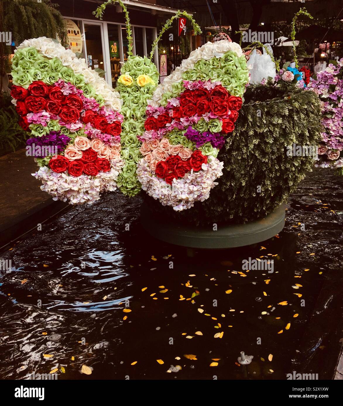 Red artificial butterfly hi-res stock photography and images - Alamy