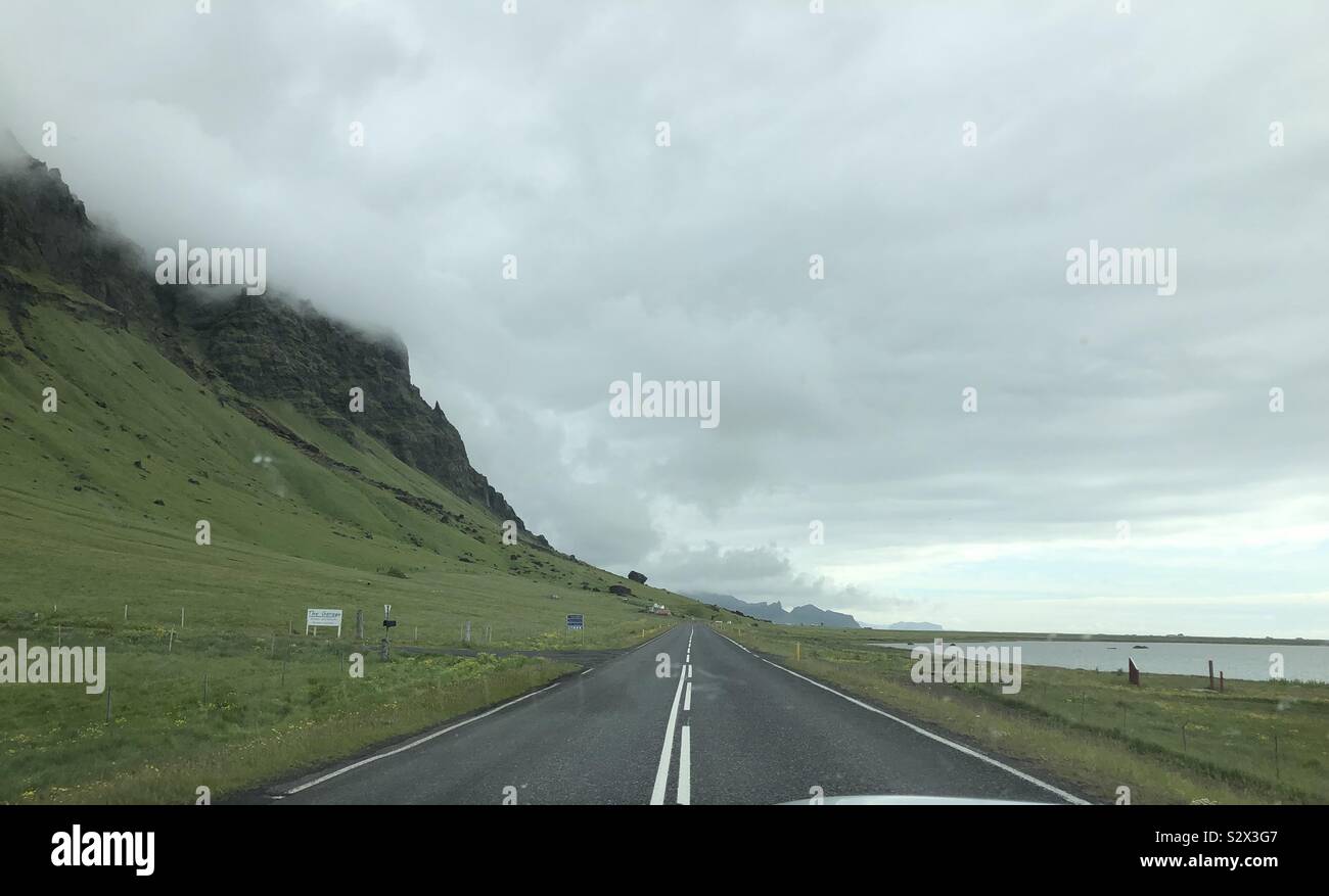 Alone way road with close sky Stock Photo - Alamy