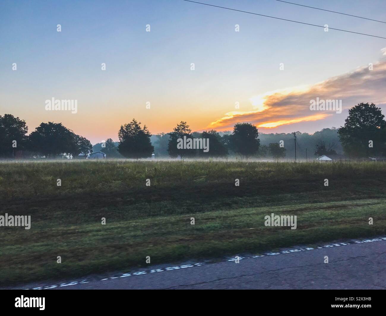 Summer sunrise mist in North Carolina Stock Photo - Alamy