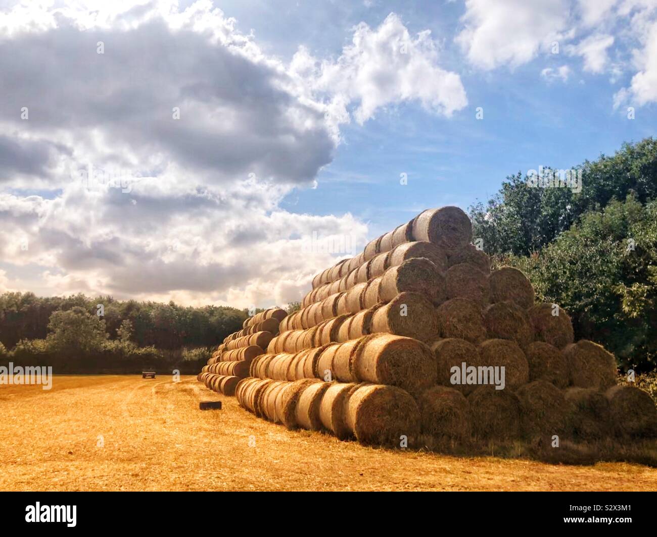 Triangular Hay Bales Stock Photo - Alamy