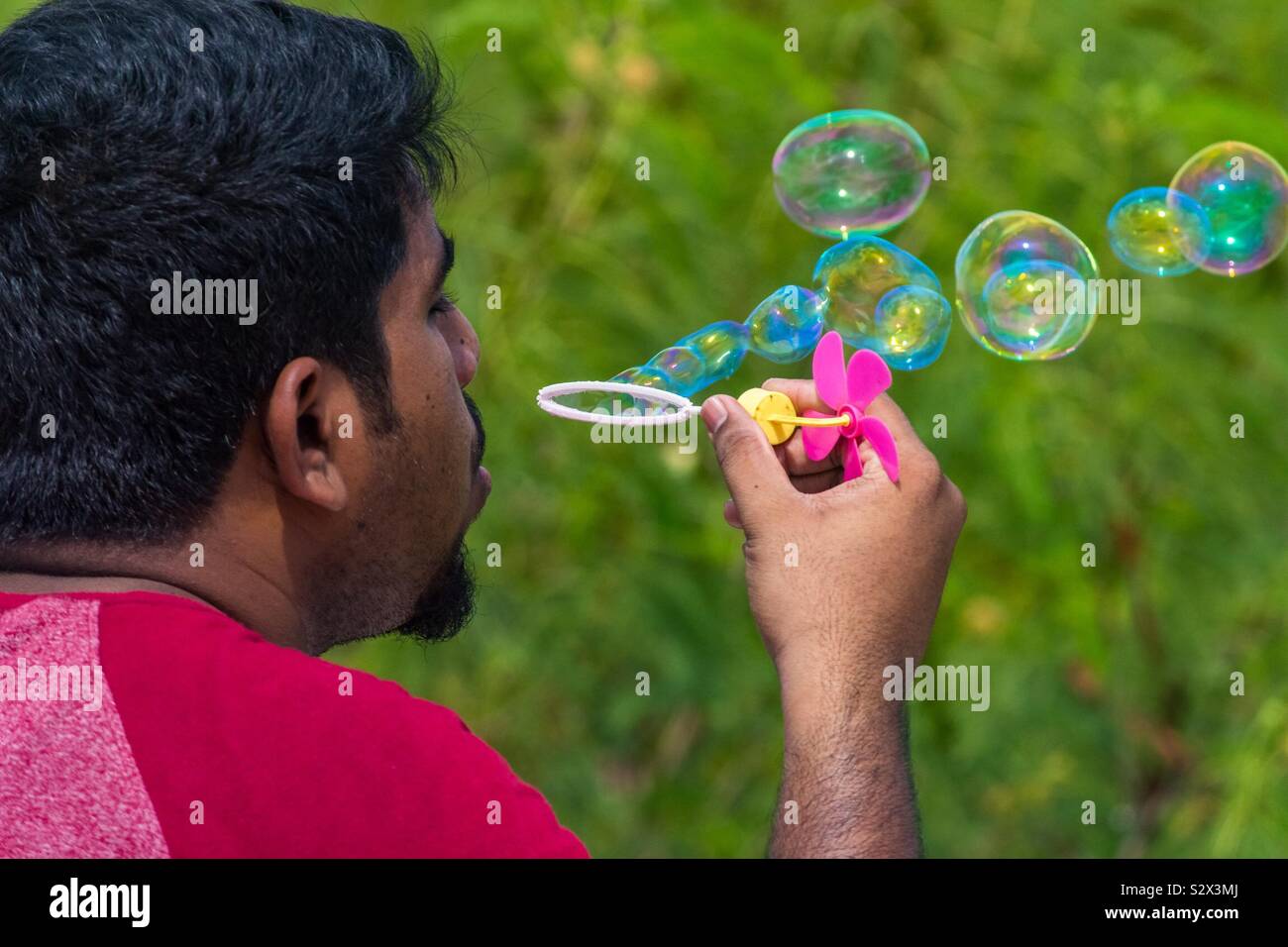 making soap bubbles Stock Photo - Alamy
