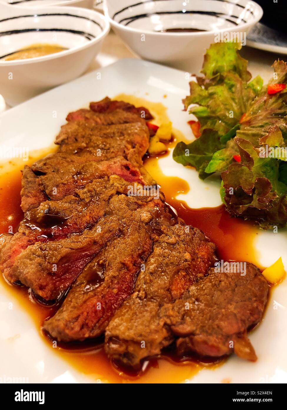Beef wagu sliced and served with sauces Stock Photo - Alamy