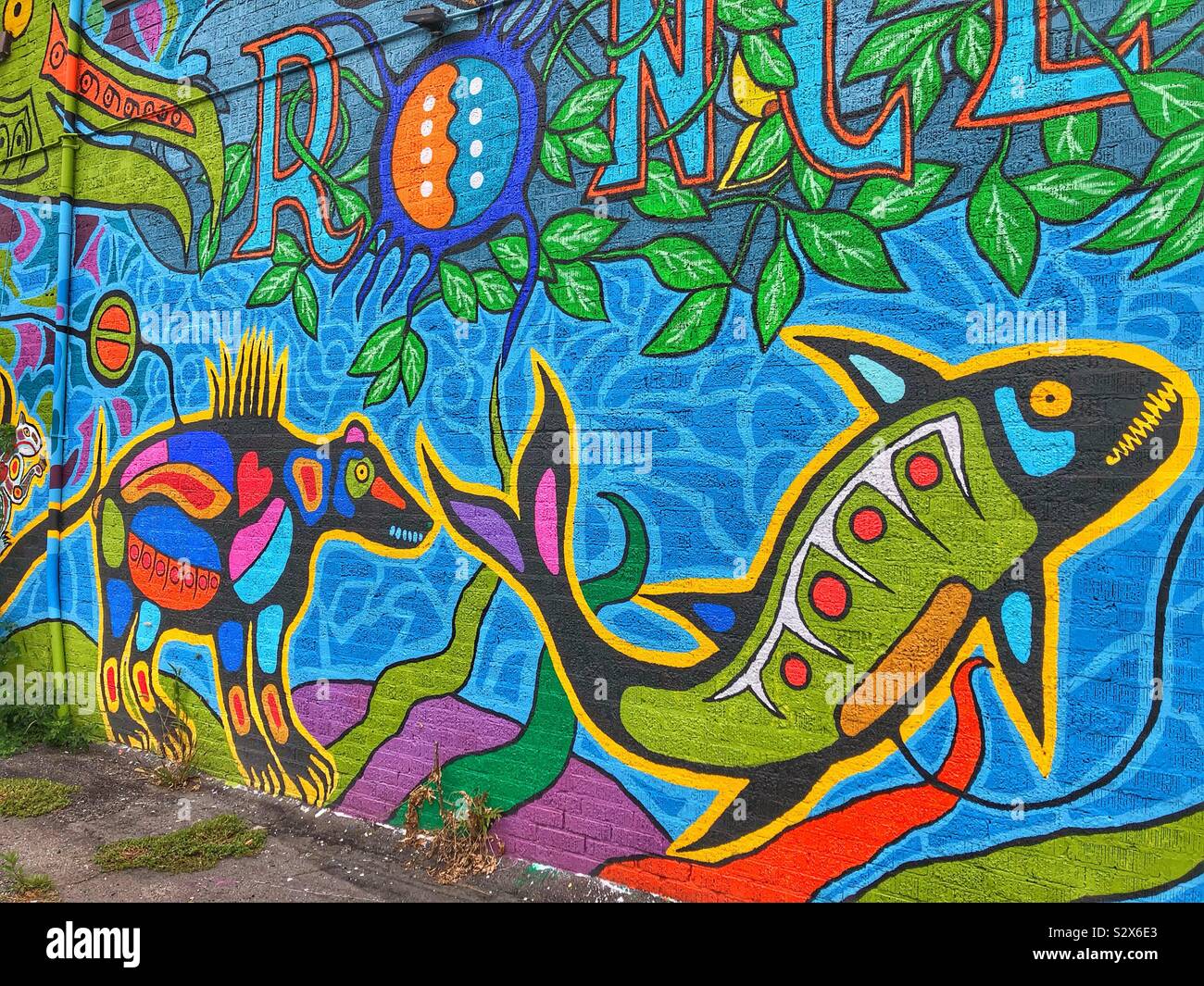 A colourful indigenous themed mural in a Toronto neighbourhood Stock ...