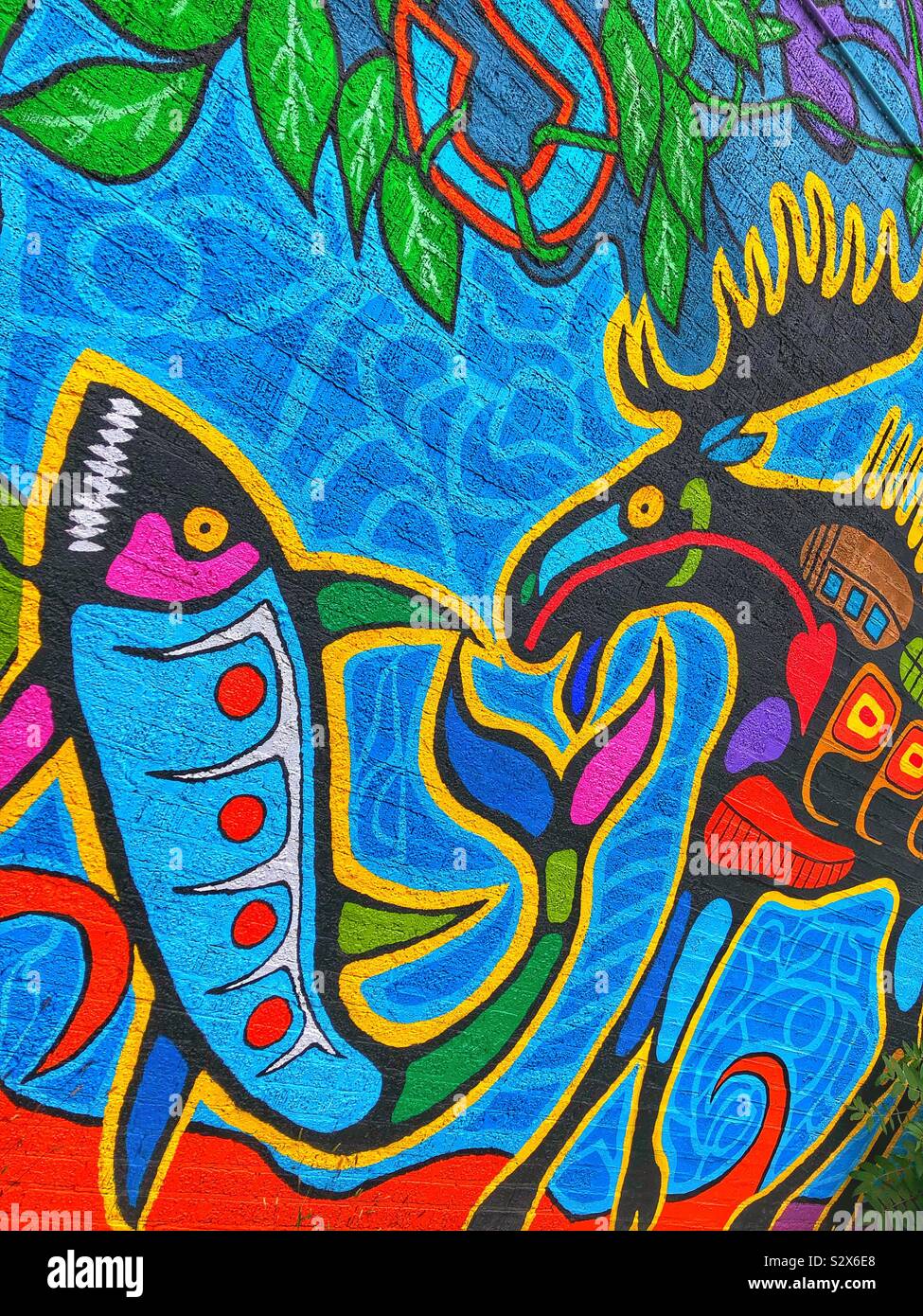 Close up of a colourful indigenous mural Stock Photo - Alamy