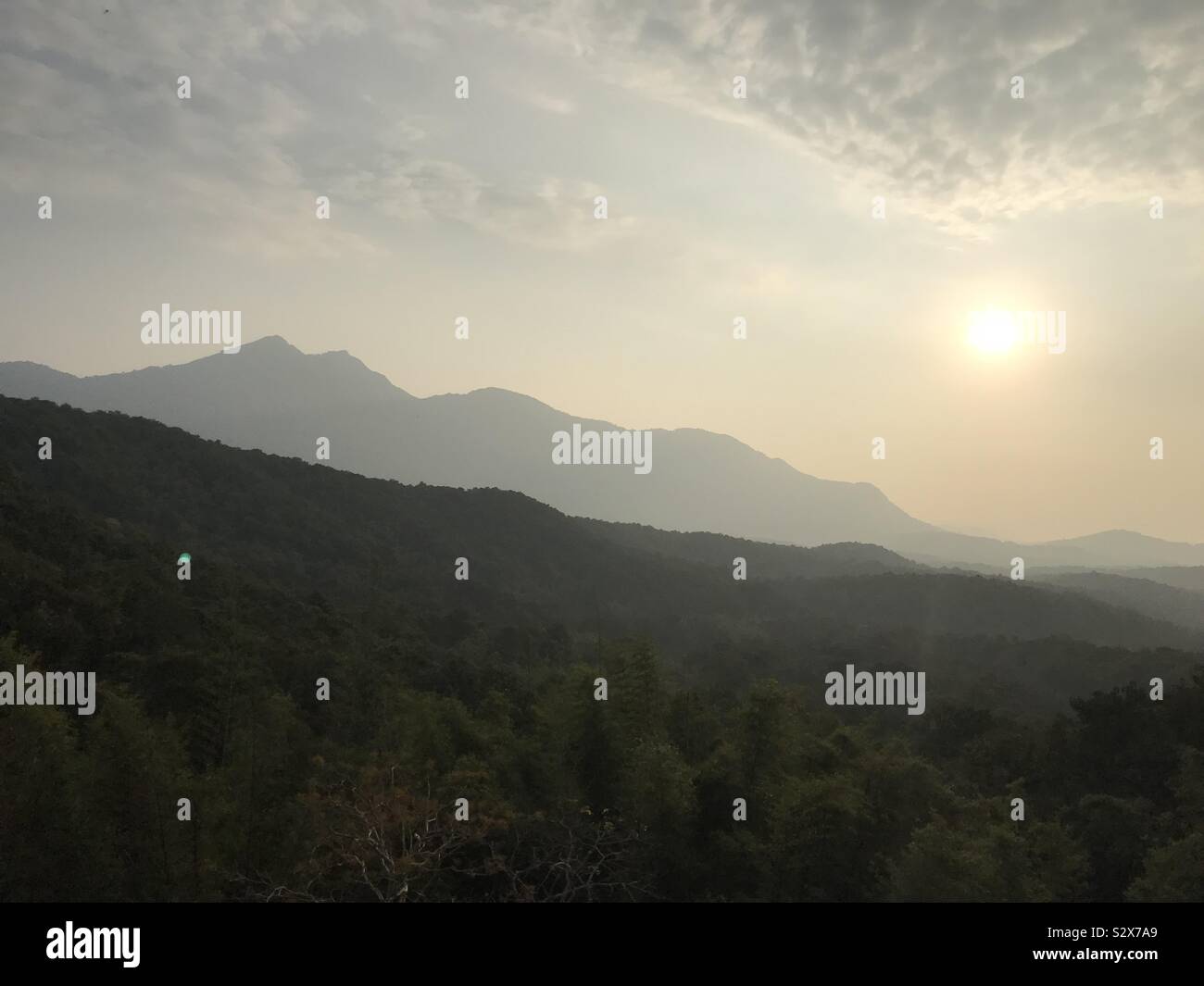 Sunset view from a mountain above sea level Stock Photo - Alamy