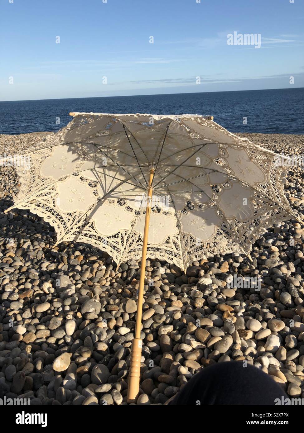 Parasol on the beach Stock Photo - Alamy