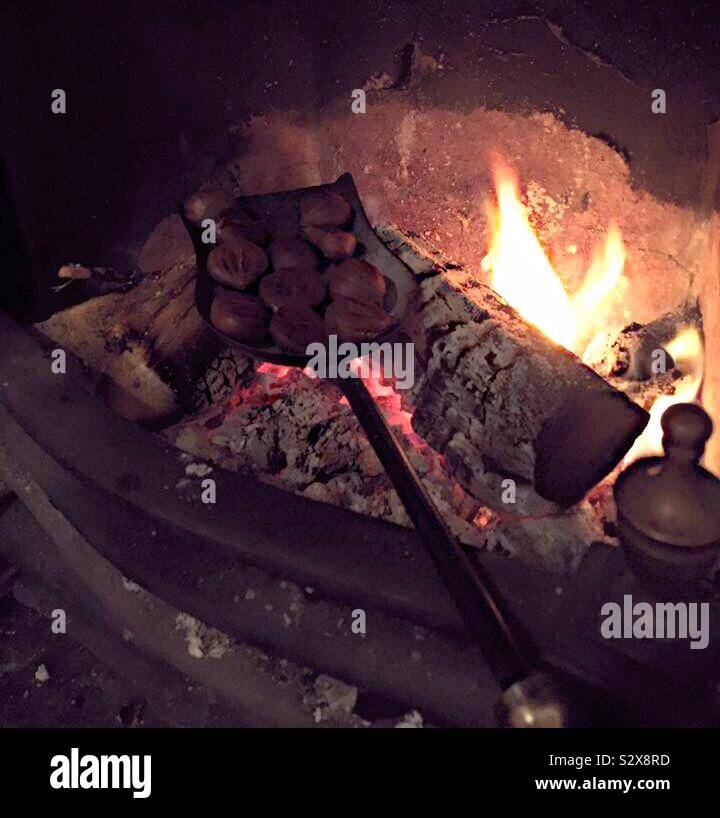 Open fire roasting chestnuts hi-res stock photography and images - Alamy