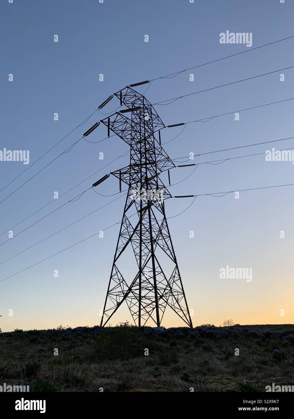 Icelandic powerline mast. Clean energy from waterfall powerplant Stock ...