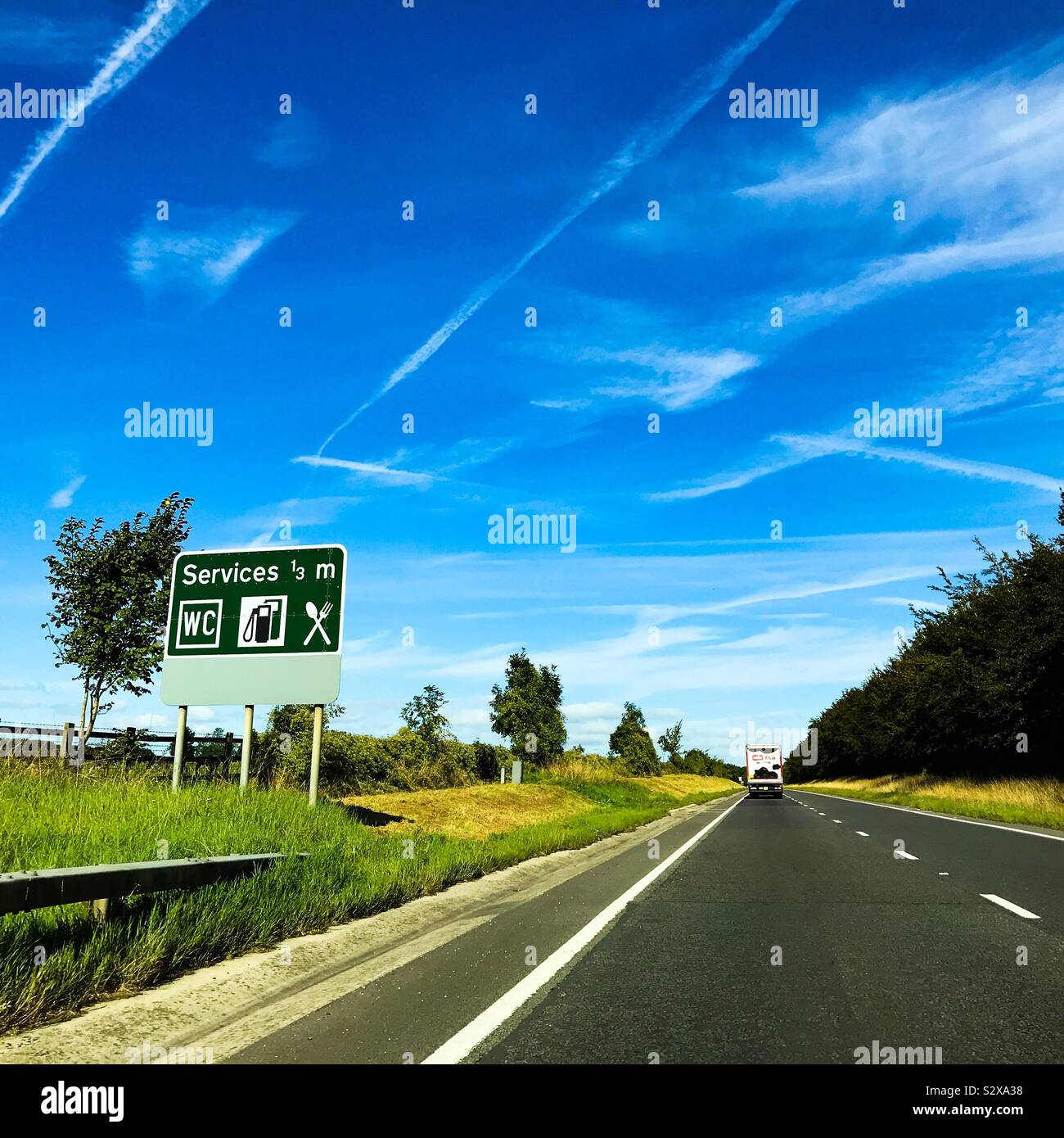 Services ahead signage sign on grass verge of A Class road in UK Stock ...
