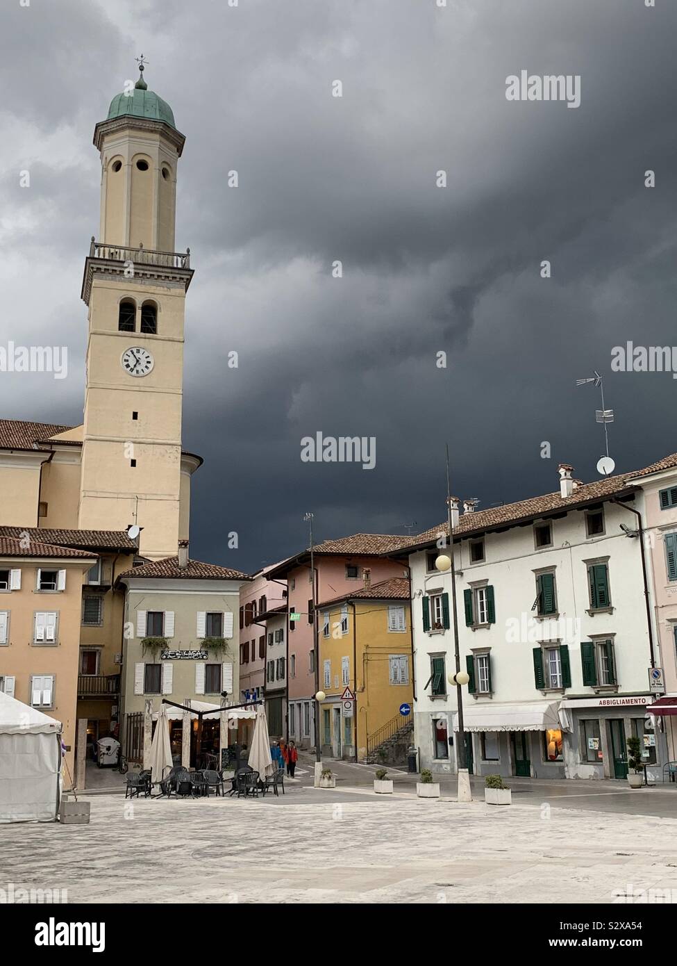 Square and Church in Cormons, Italy, on a stormy evening Stock Photo ...