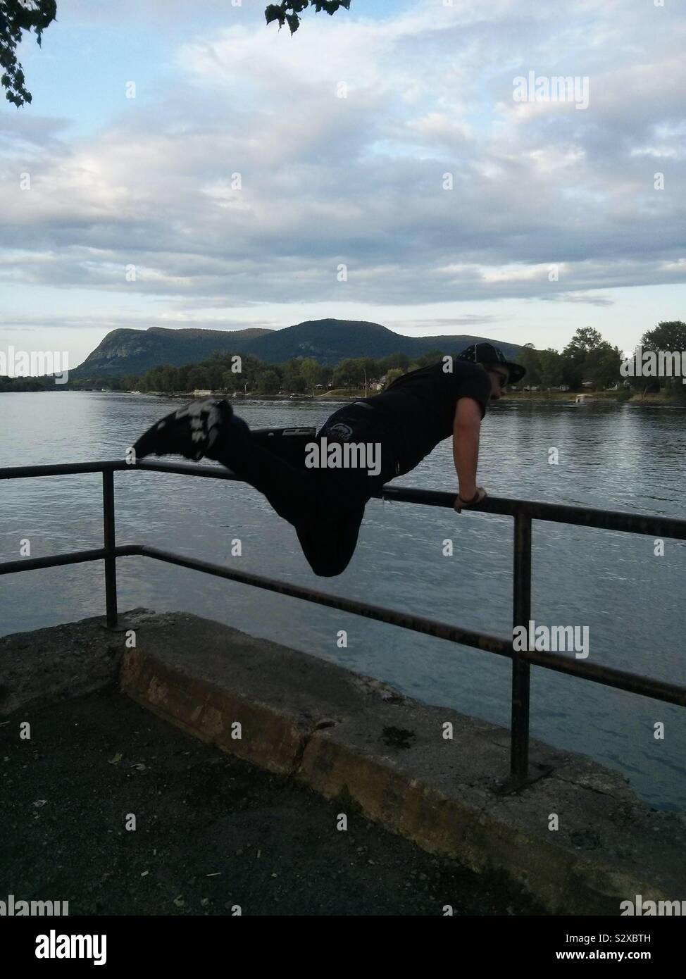 A young man jumping up in the air Stock Photo - Alamy