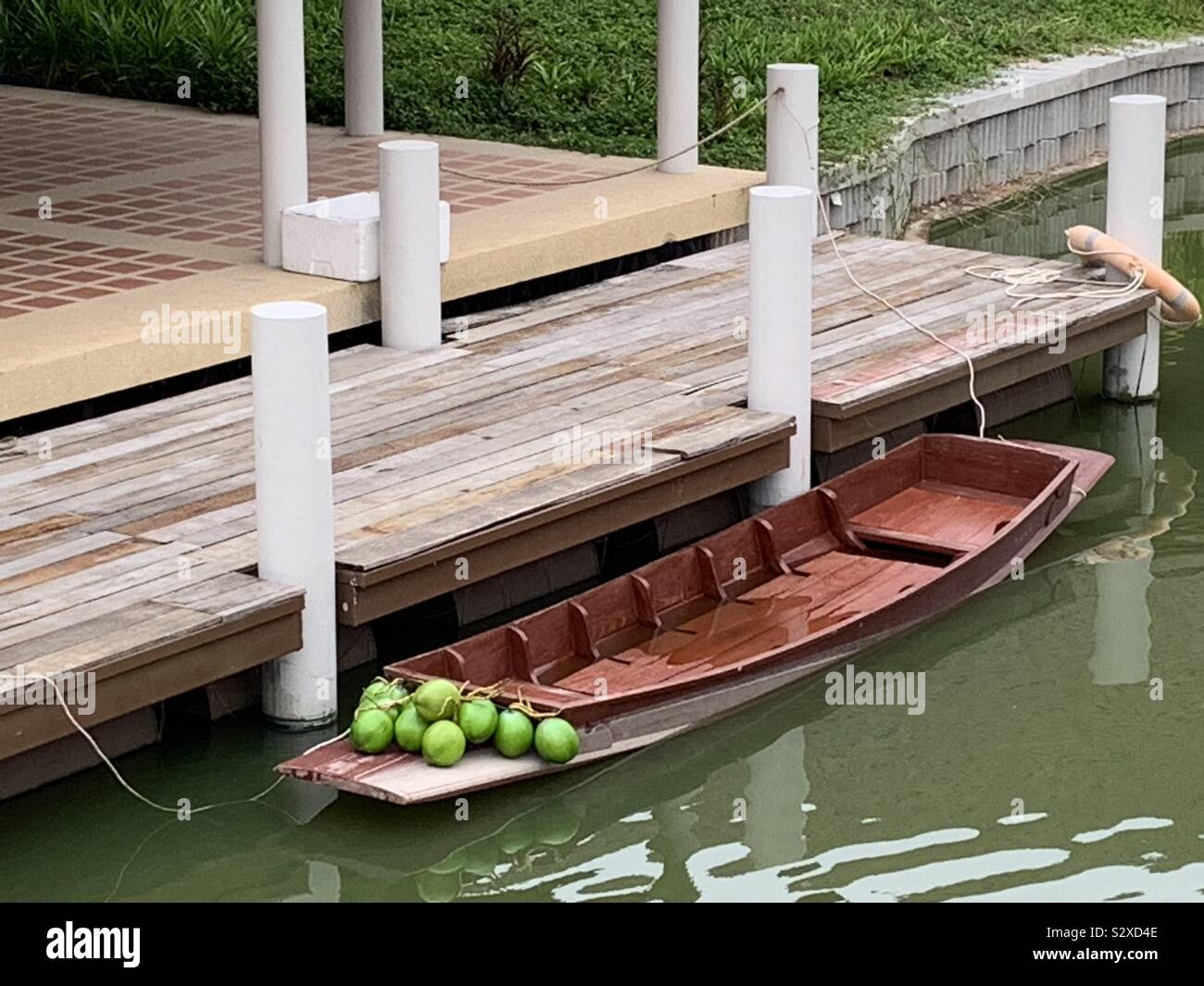 Boat with coconuts on the back Stock Photo - Alamy