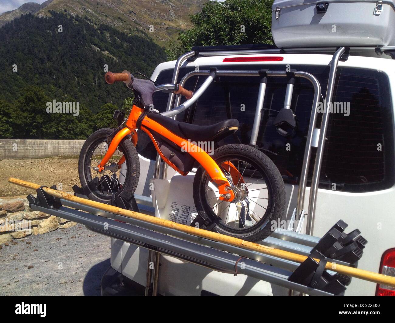 Child's bicycle behind a motorhome Stock Photo - Alamy