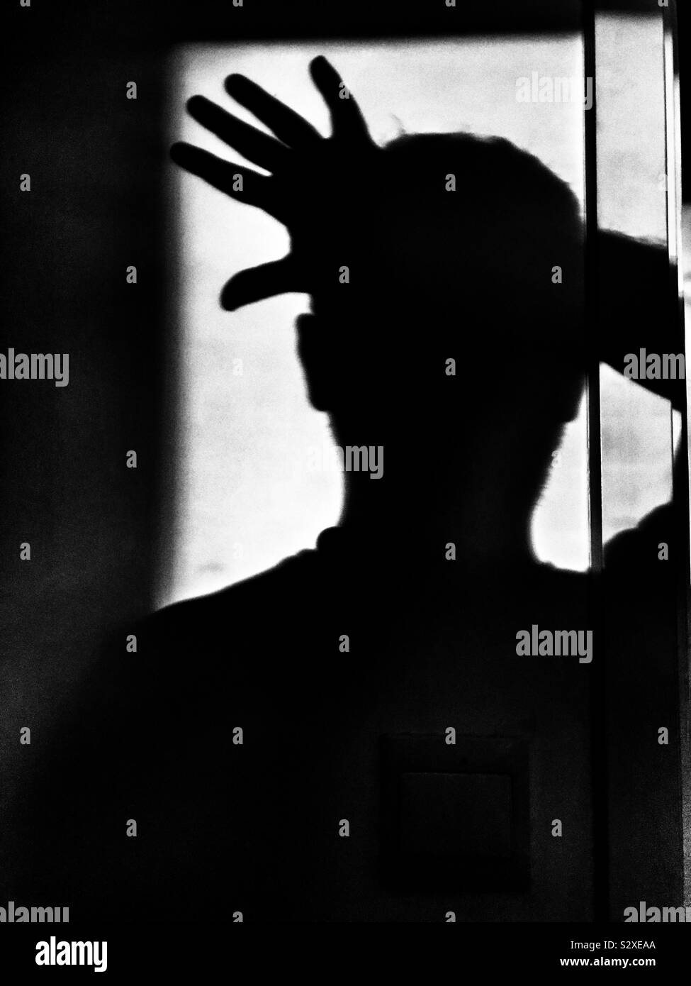 Silhouette / shadow of a man Stock Photo - Alamy
