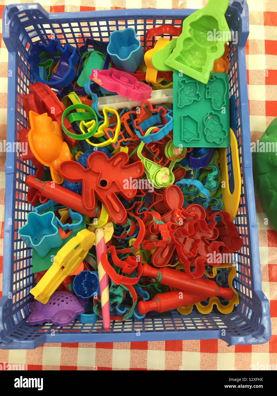 Box of playdough toys cutters dough Stock Photo - Alamy
