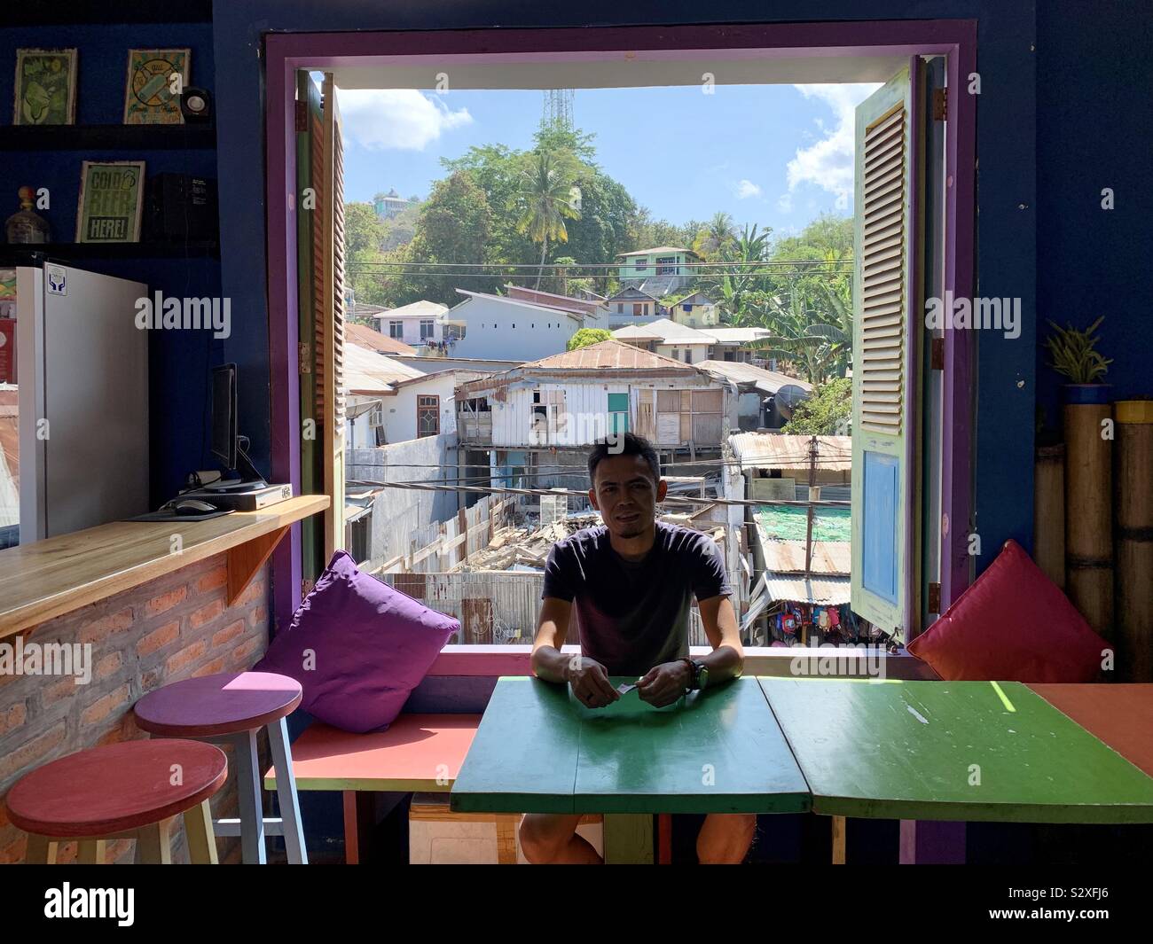 Having a breakfast in Labuan Bajo cafe Stock Photo - Alamy