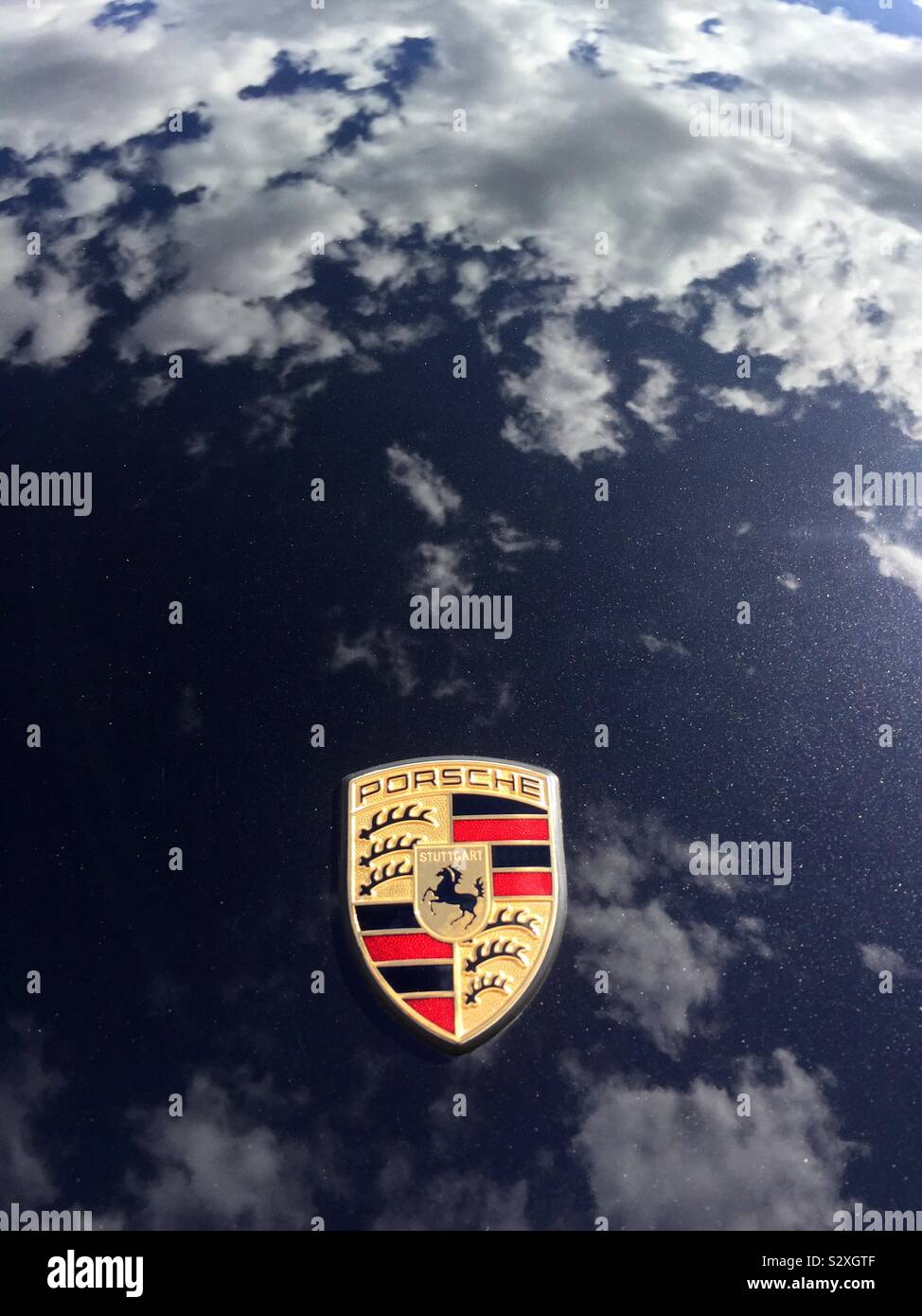 Porsche car badge Stock Photo - Alamy