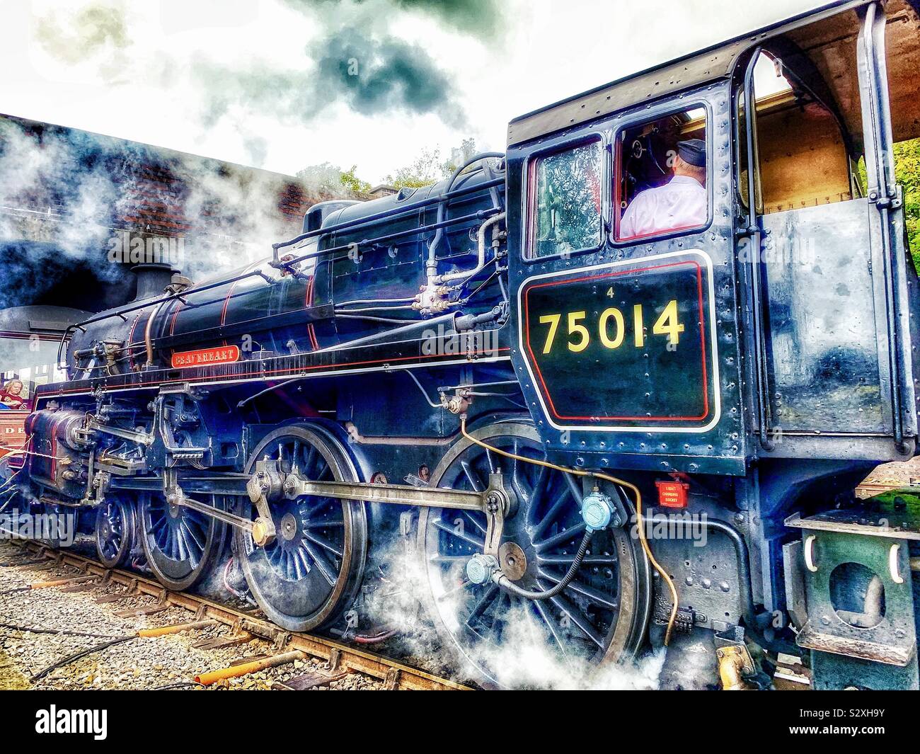 Steam Train in motion Stock Photo - Alamy