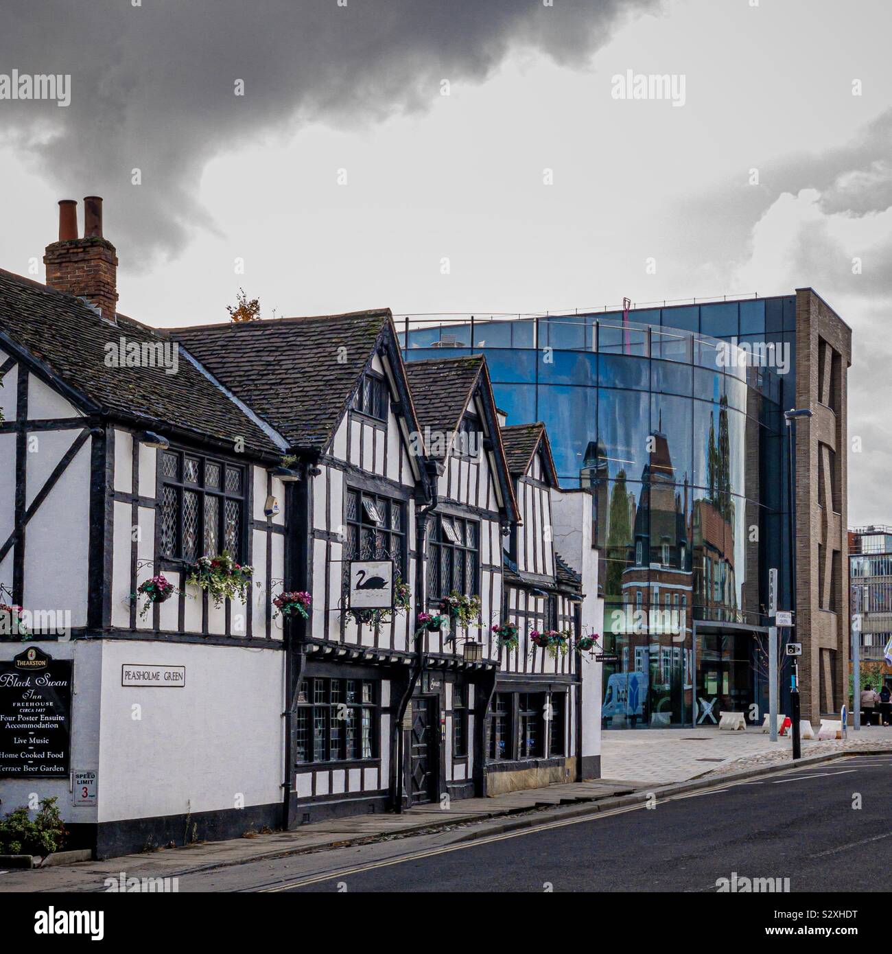 Black Swan pub and Hiscox insurance building in York showing old and ...