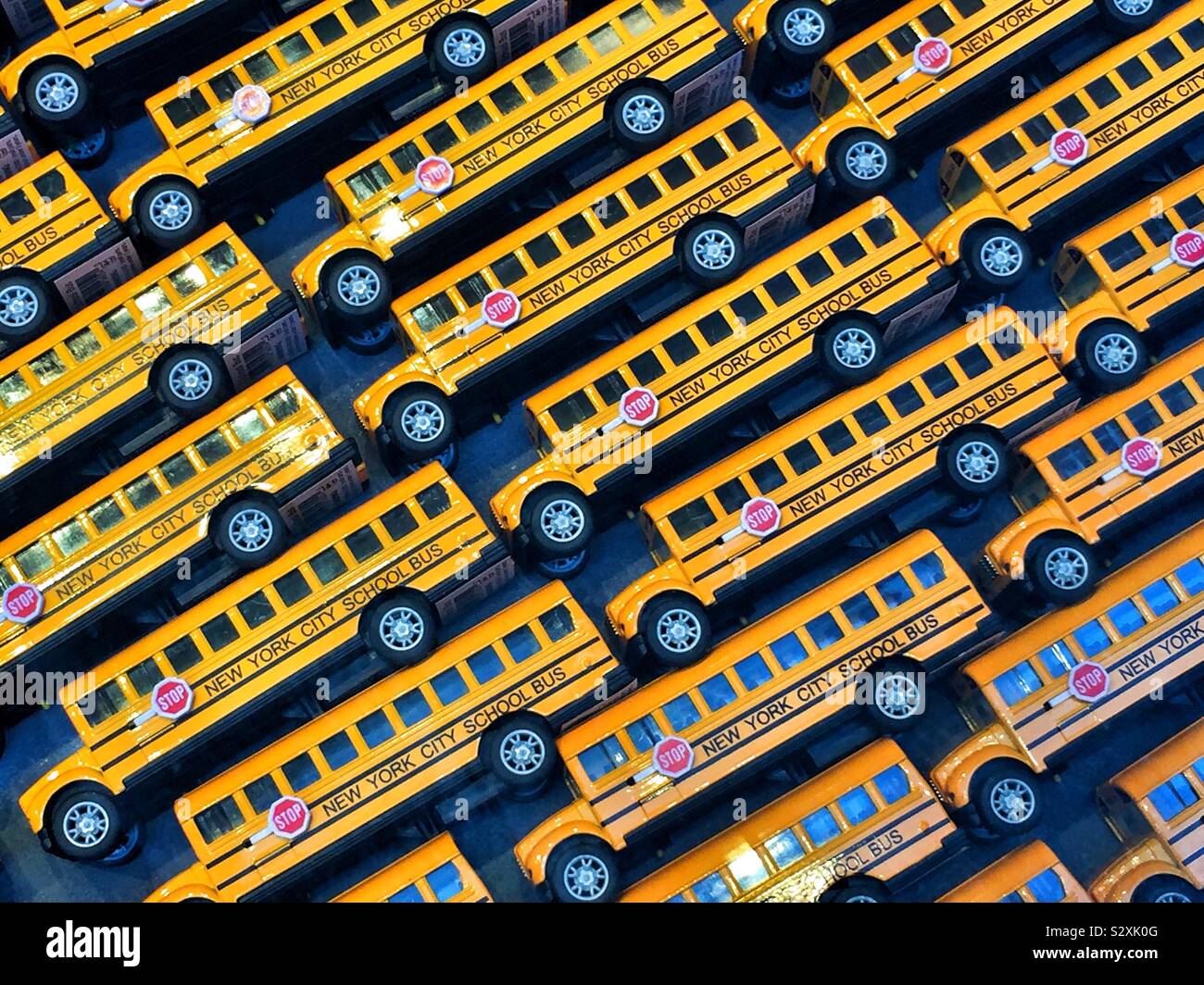 Toy New York City school buses in a store window Stock Photo - Alamy