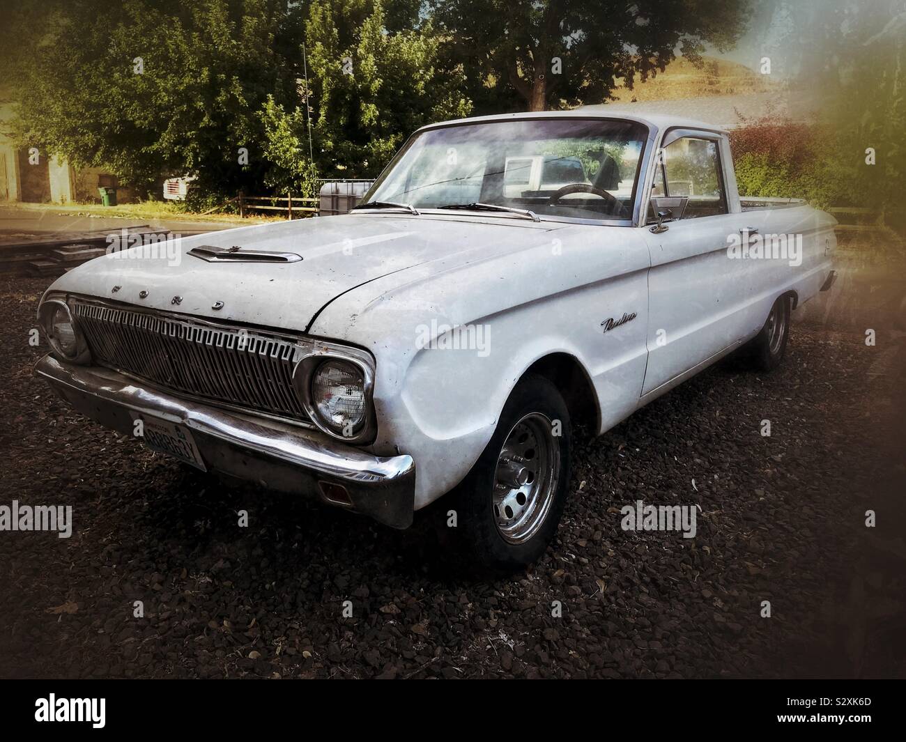 Grunge photo of white vintage Ford Ranchero in 3/4 view Stock Photo - Alamy