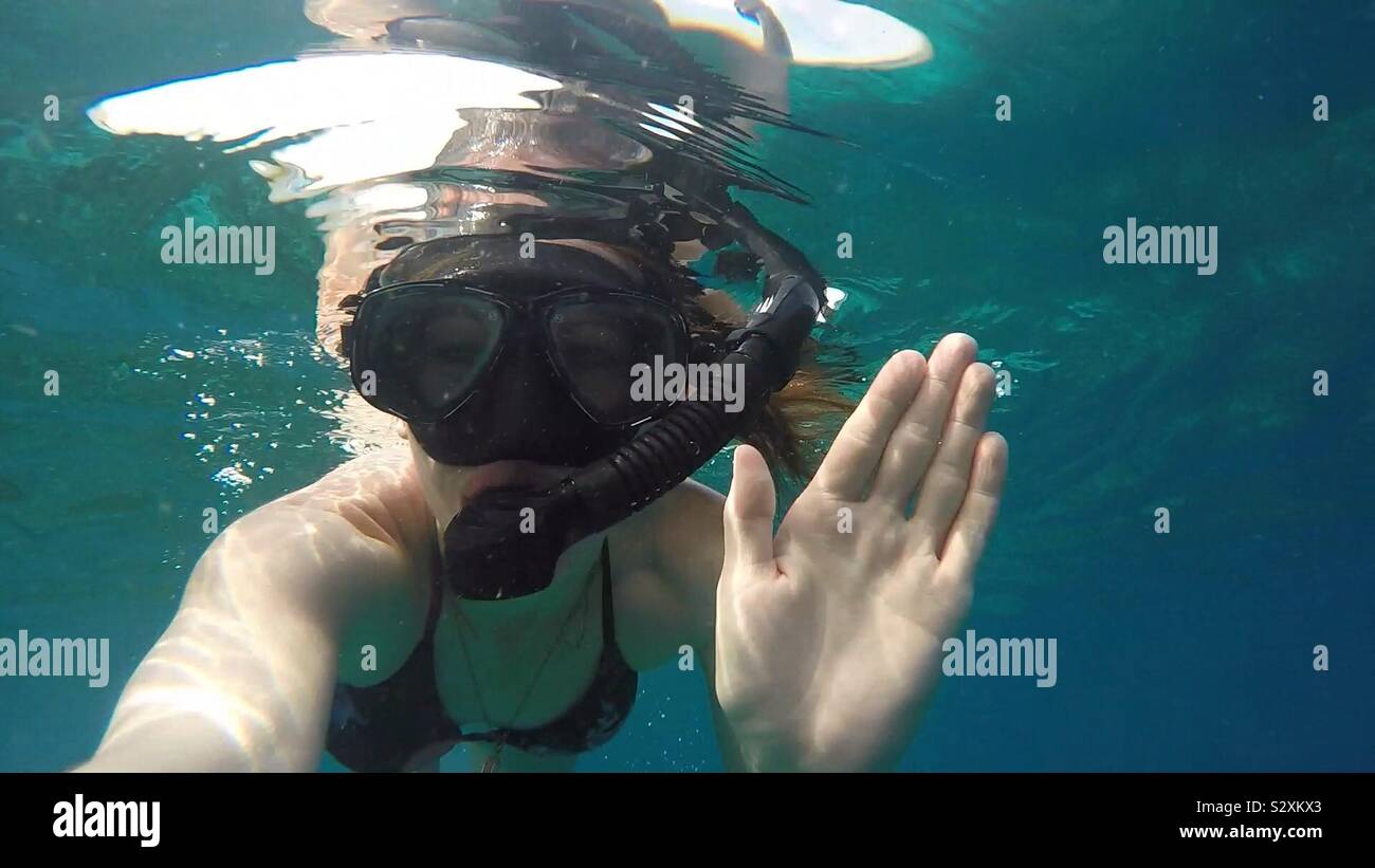 Girl snorkelling hi-res stock photography and images - Alamy