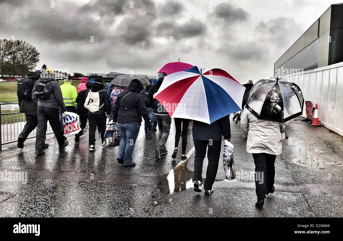 Crowds Leaving The BTCC In The Rain With Their Umbrellas Up ...
