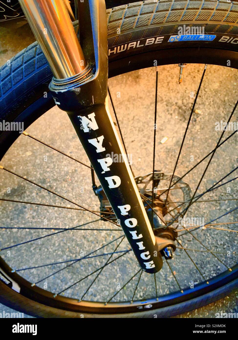 Close up of a front wheel of a New York City Police Department bicycle ...
