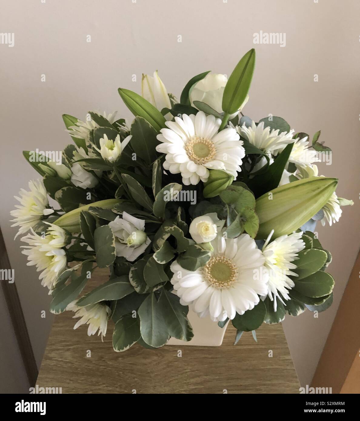 White rose with greenery hi-res stock photography and images - Alamy