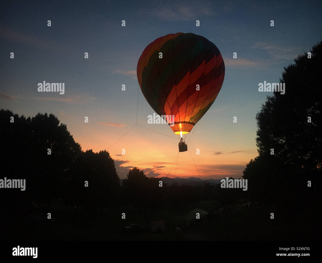 Hot air ballon at sunset Stock Photo - Alamy