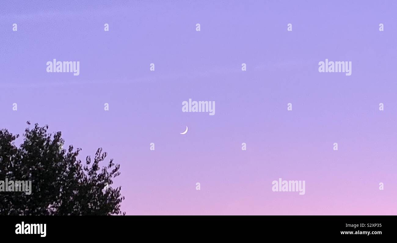 Purple sky at dusk Stock Photo - Alamy