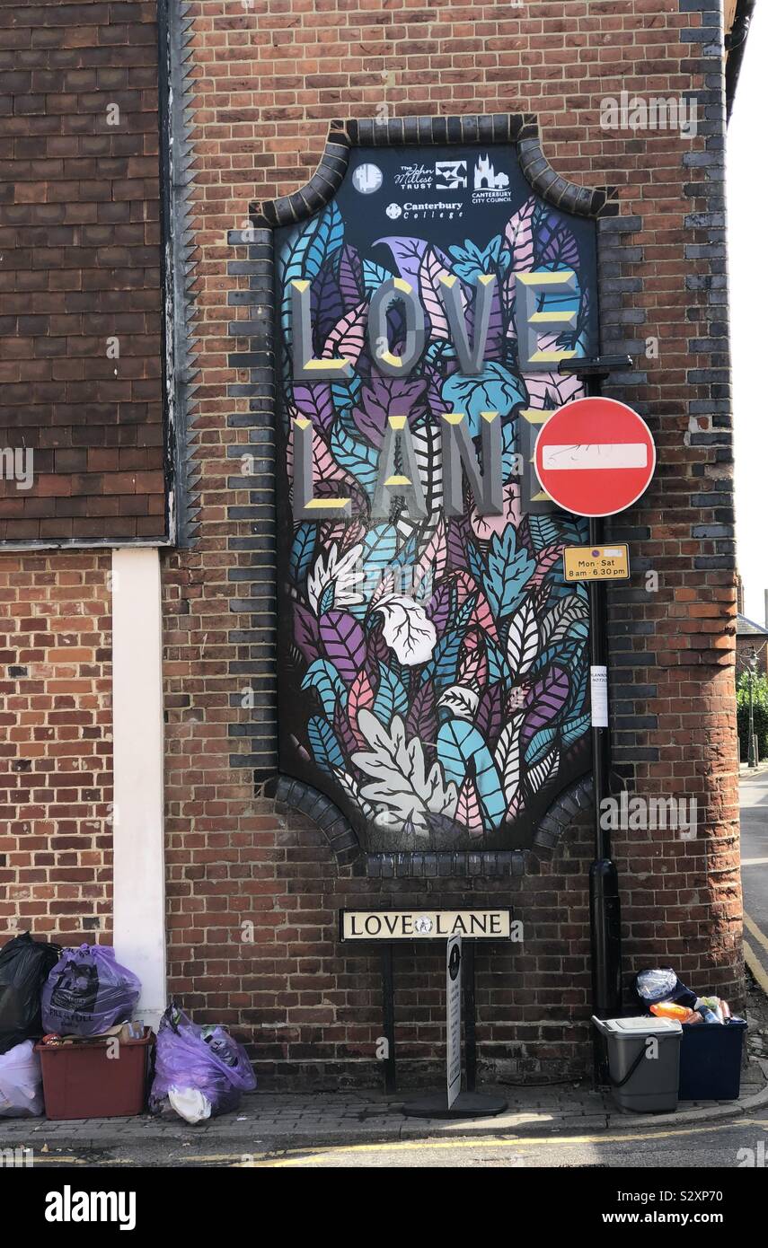 “Mixed Emotions” - street mural depicting love love and contrasts Stock ...