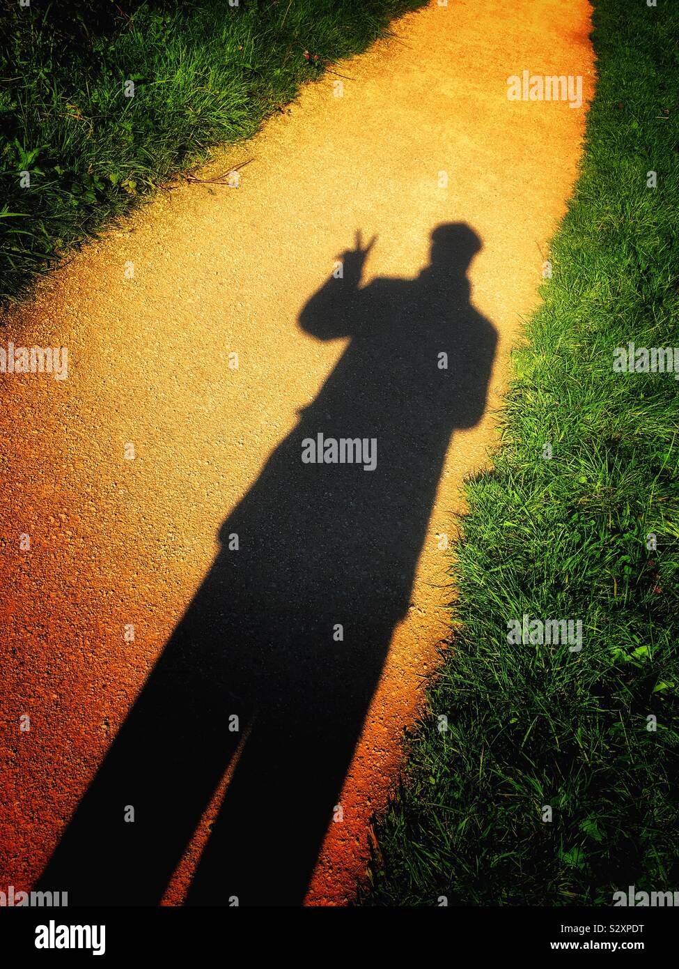 Shadow figure with peace symbol Stock Photo - Alamy