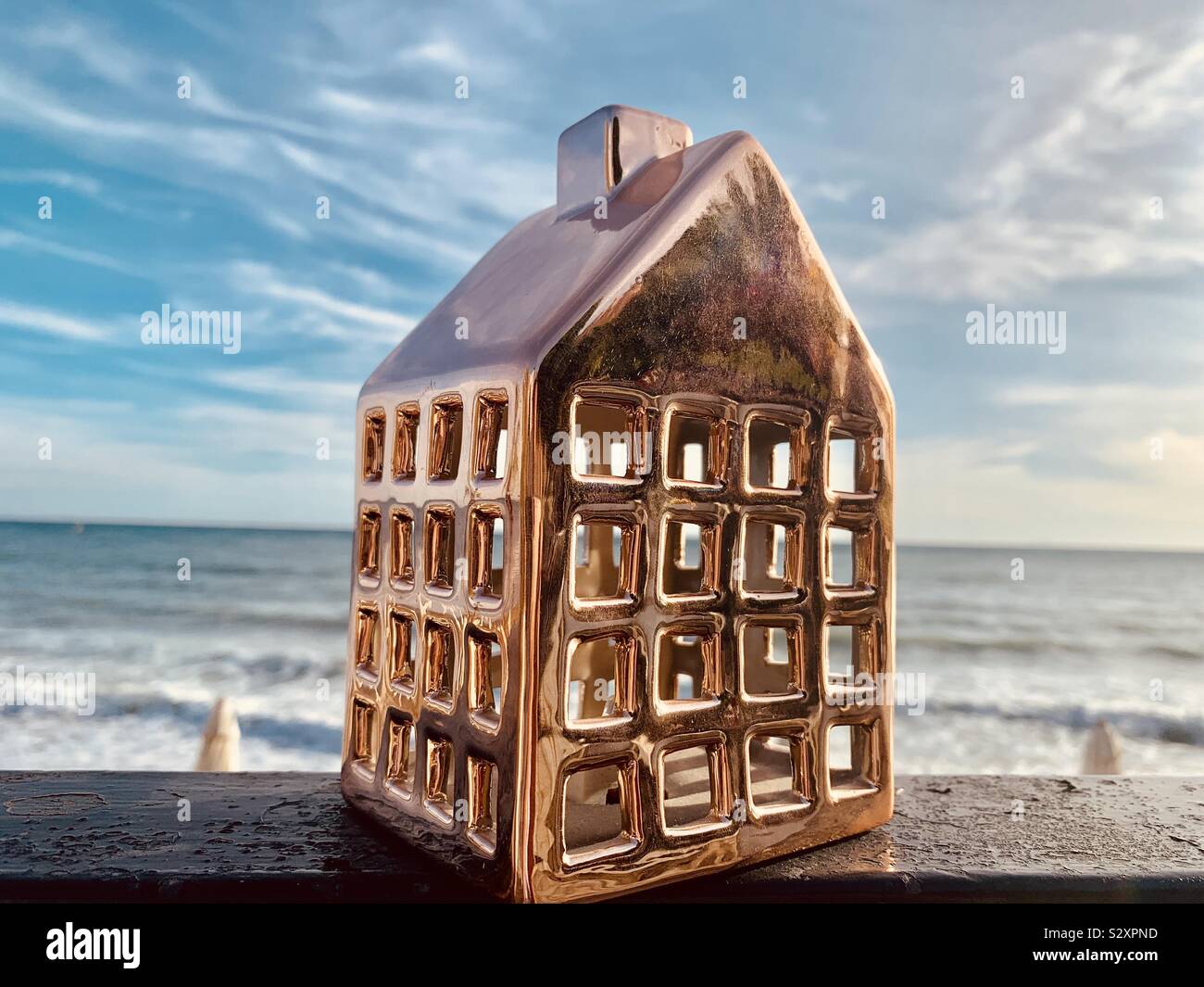 Golden Miniature House Stock Photo - Alamy