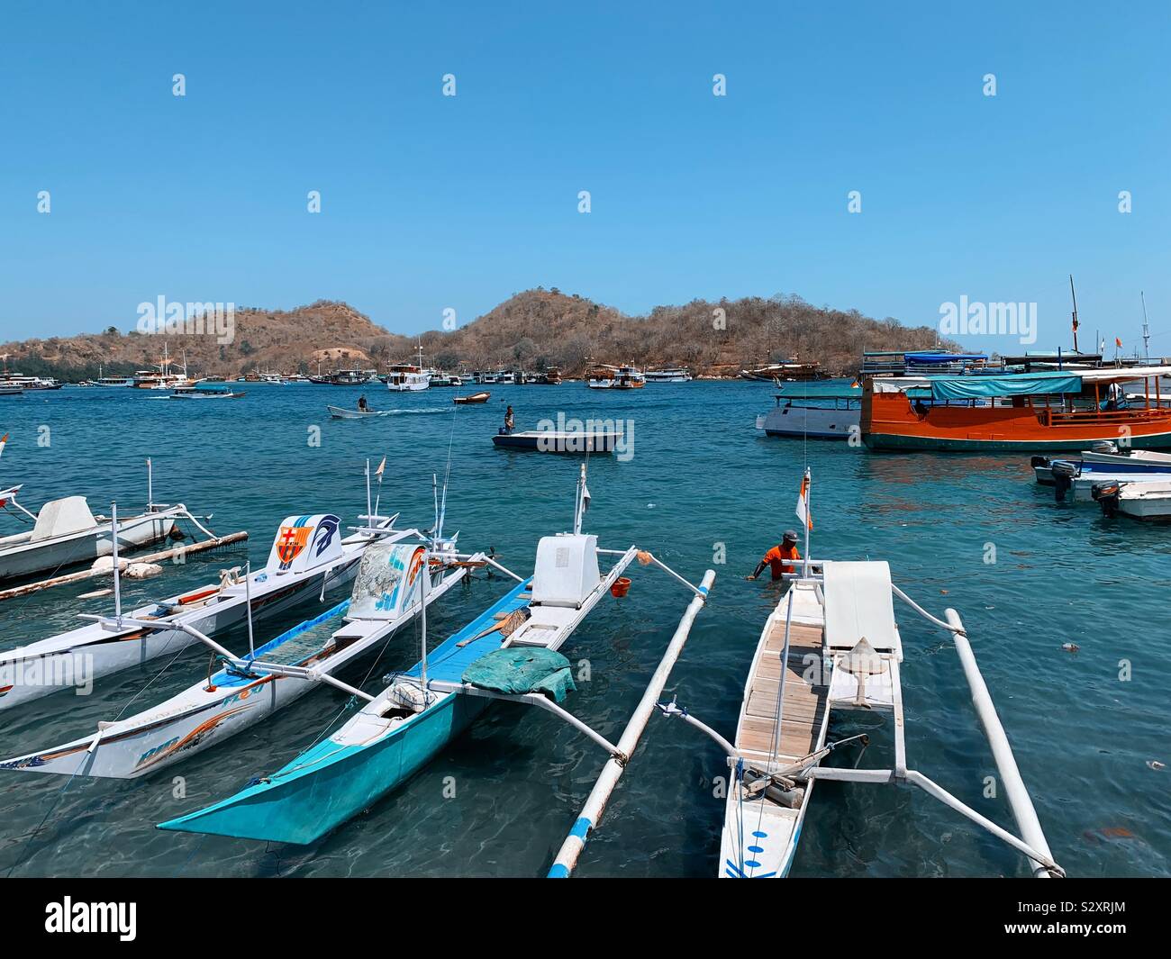 Labuan Bajo jetty scene Stock Photo - Alamy