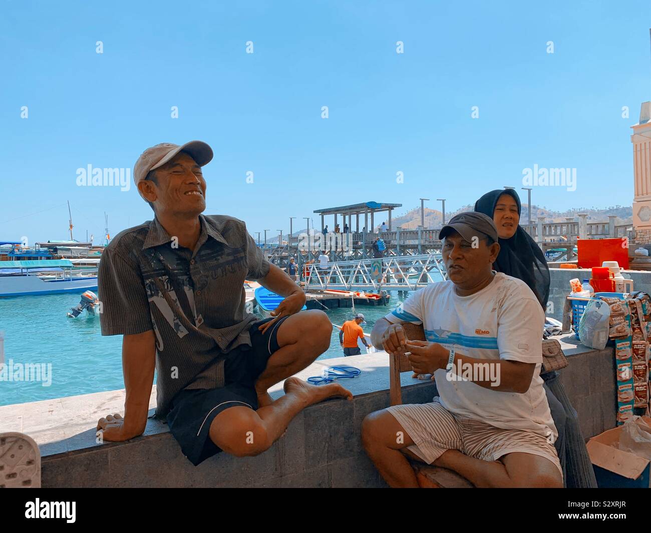 Local people chatting hi-res stock photography and images - Alamy