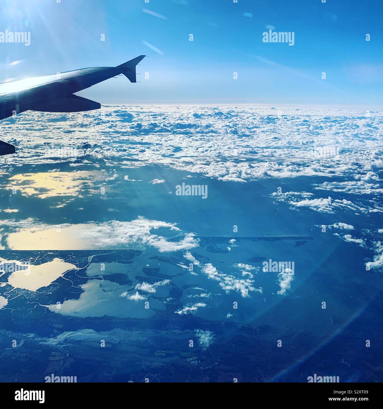 Flying over land and ocean, East Coast, United States Stock Photo - Alamy