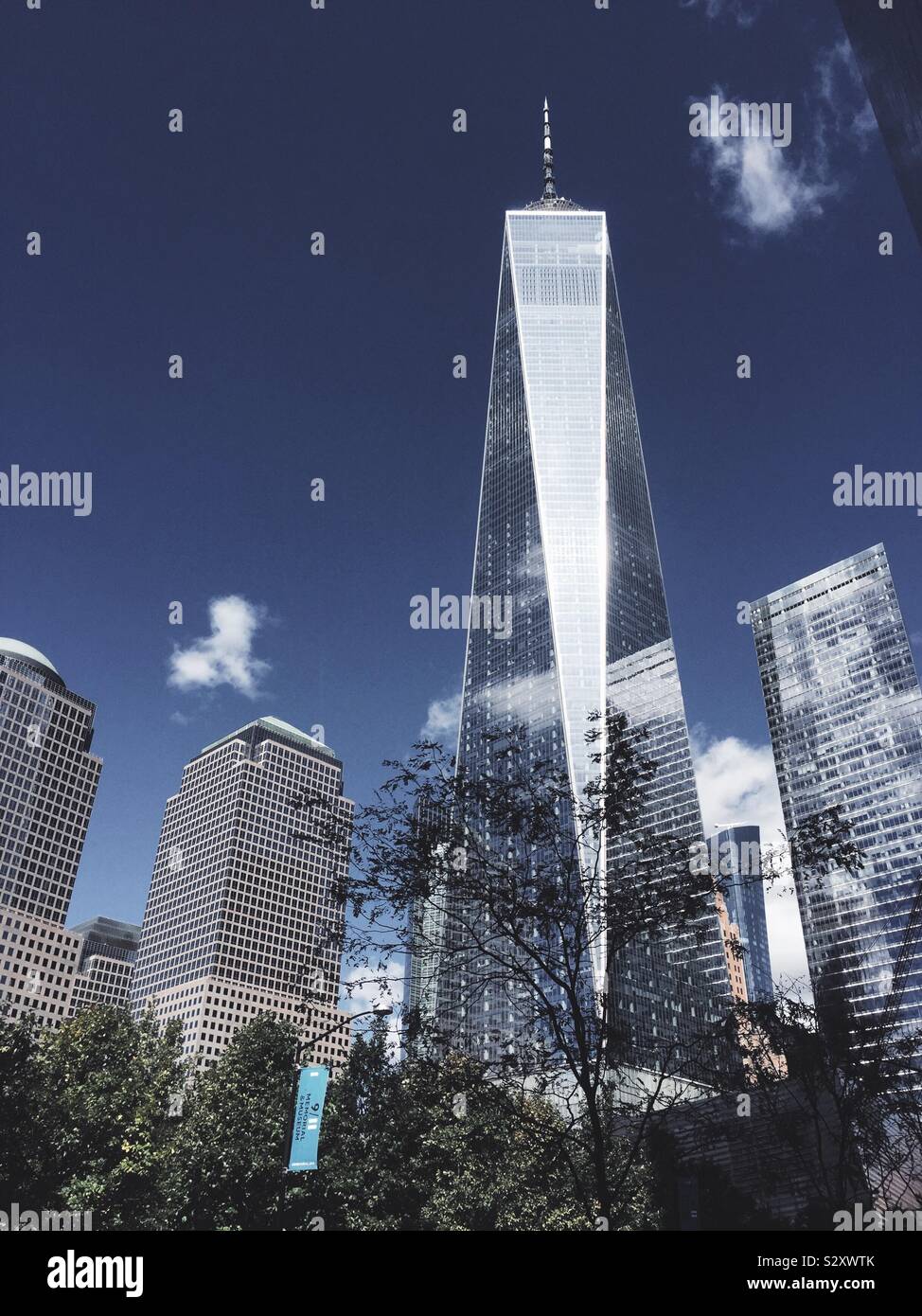 One world trade skyscraper with the 911 Memorial in the foreground, NYC ...