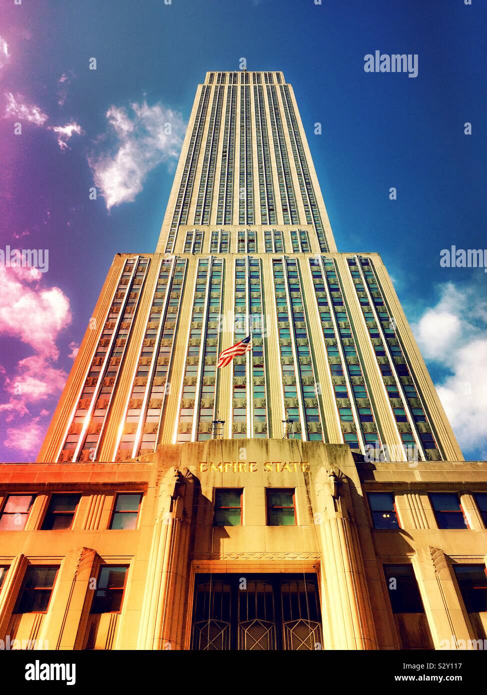 The front entrance of the empire state building is on fifth Avenue in ...