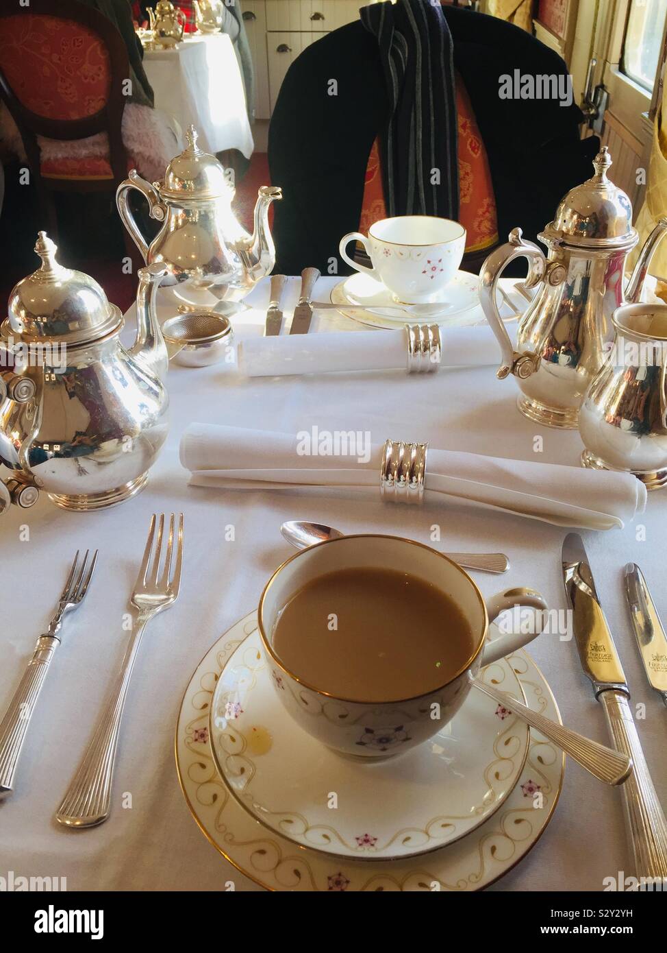 Quirky afternoon tea on board a renovated train Stock Photo - Alamy