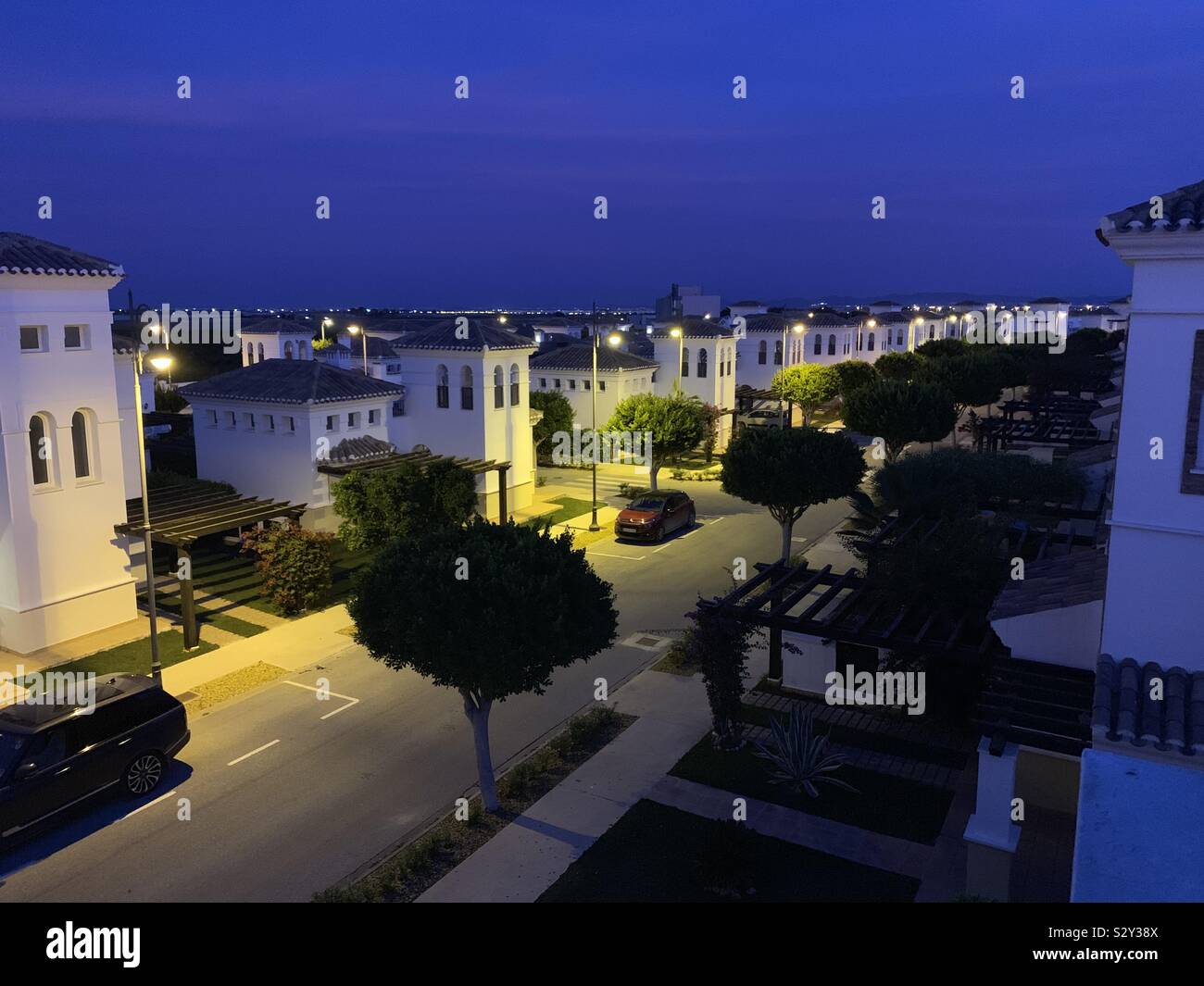 Spanish suburban street at night Stock Photo - Alamy