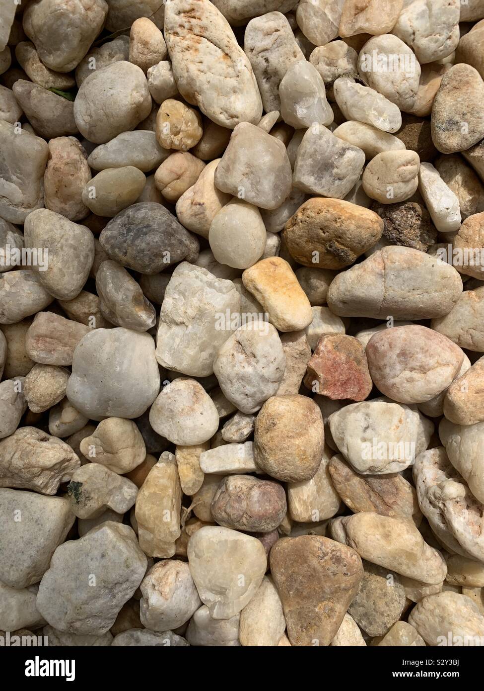 Natural tone river rocks Stock Photo - Alamy