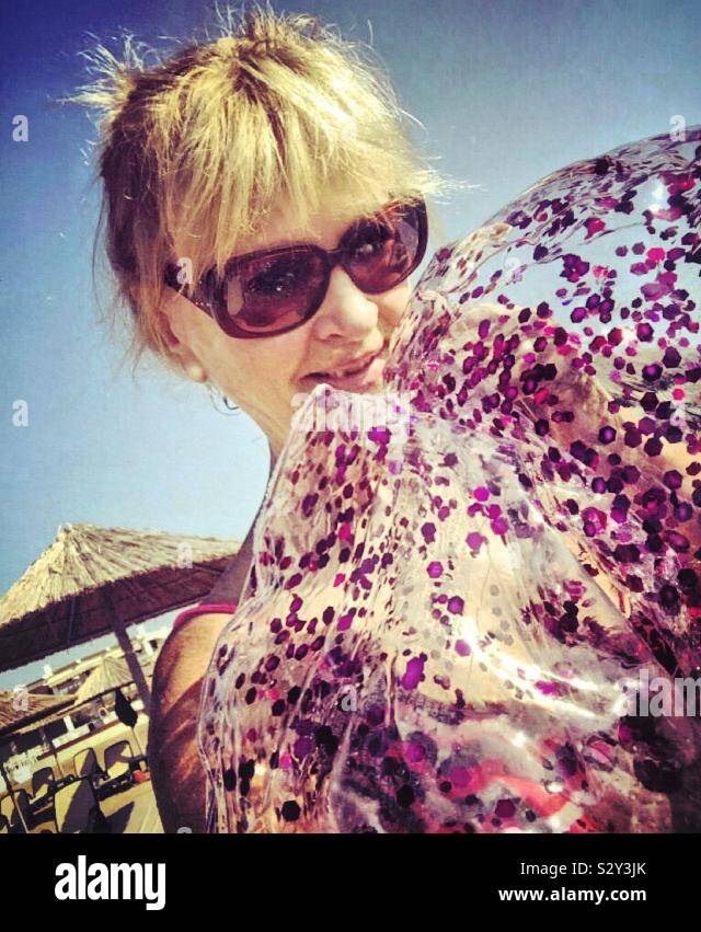 Colorfully floating tire Stock Photo - Alamy