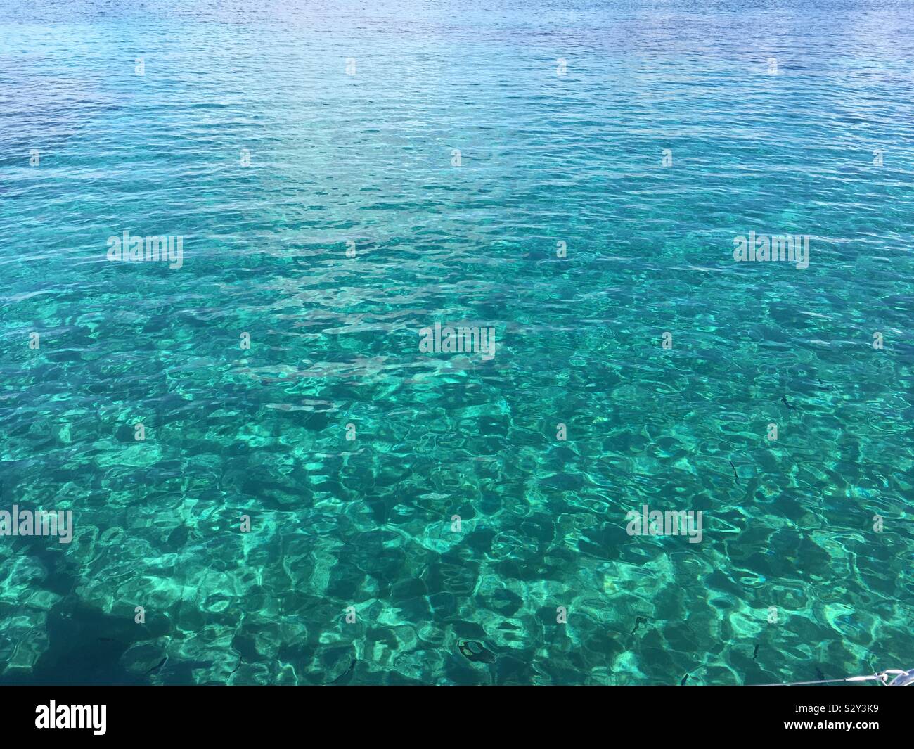 The crystal clear turquoise ocean hi-res stock photography and images ...