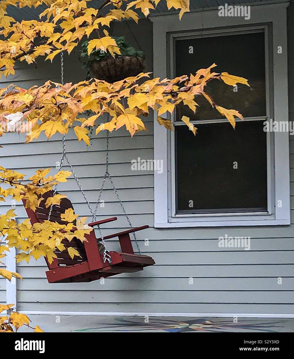 Fall color and front porch swing in Stillwater, Minnesota Stock Photo ...