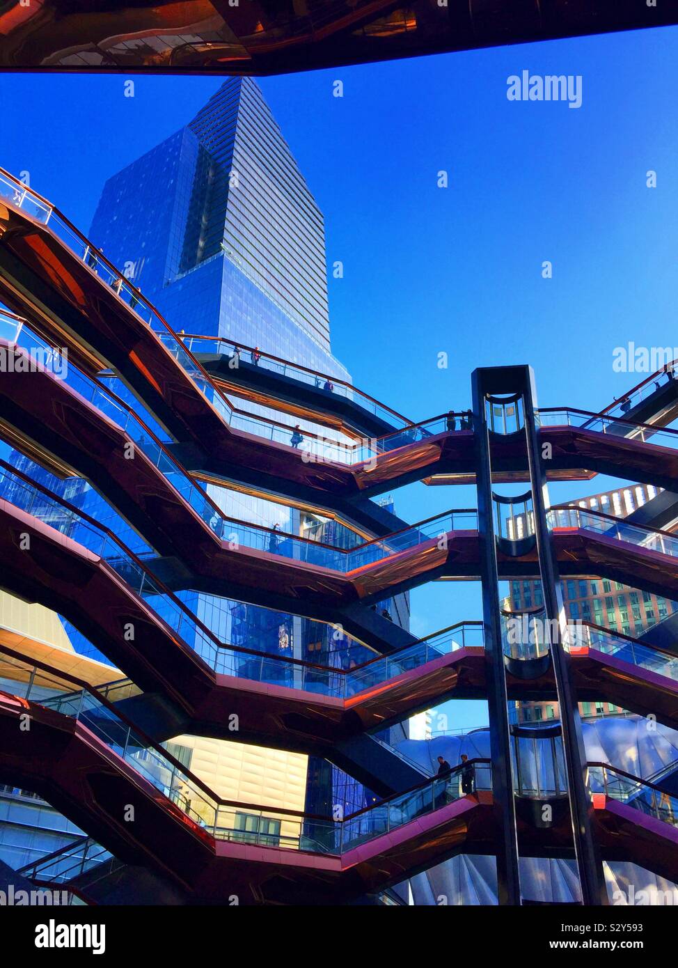 The vessel is a metallic honeycombed viewing platform in Hudson yards ...
