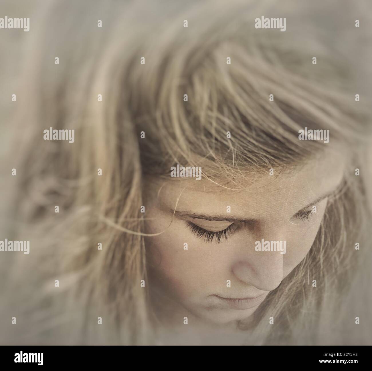 Young Child Deep in thought Stock Photo - Alamy