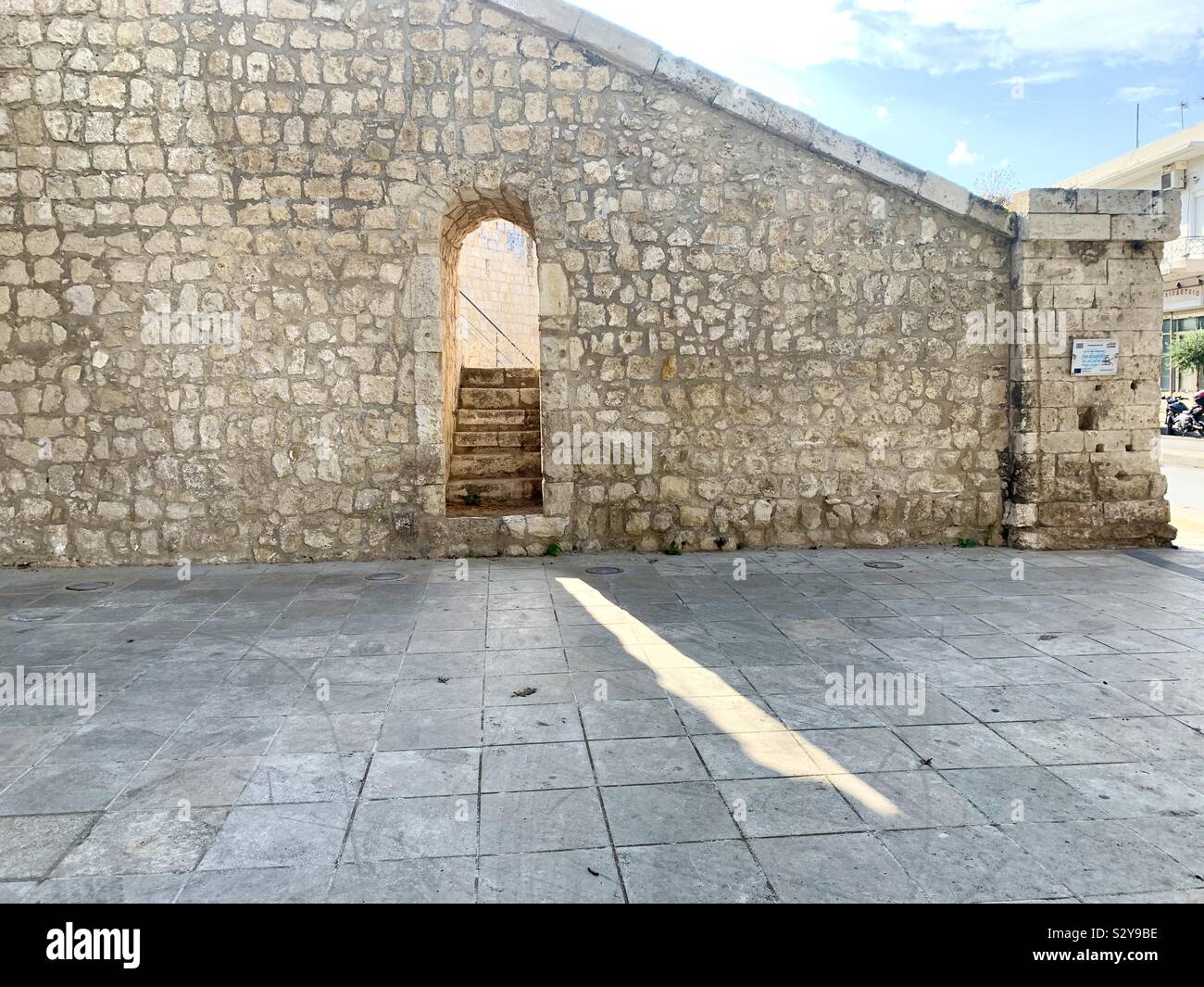 Ancient European wall with arch opening Stock Photo - Alamy