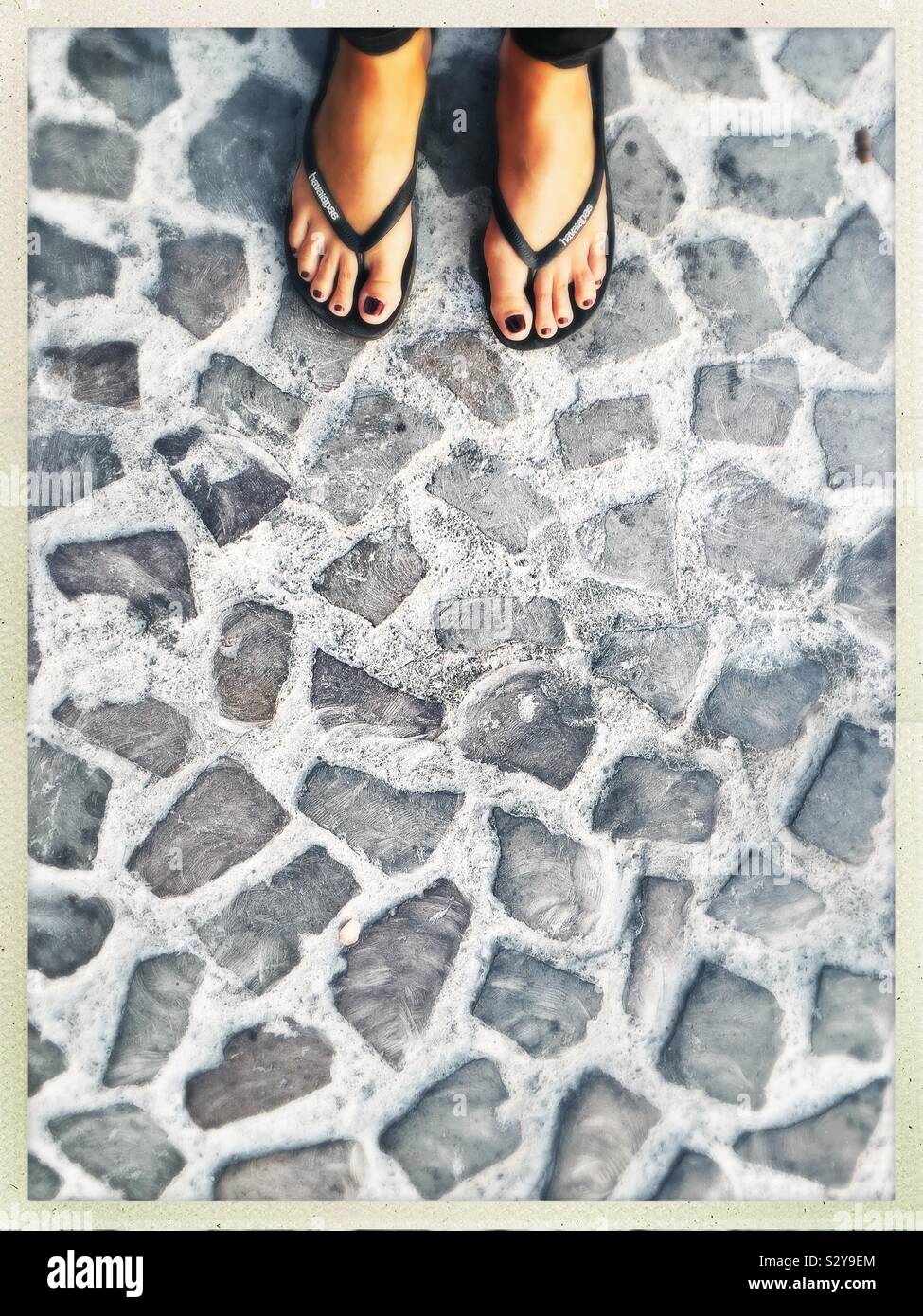 Feet on the cobbles Stock Photo - Alamy